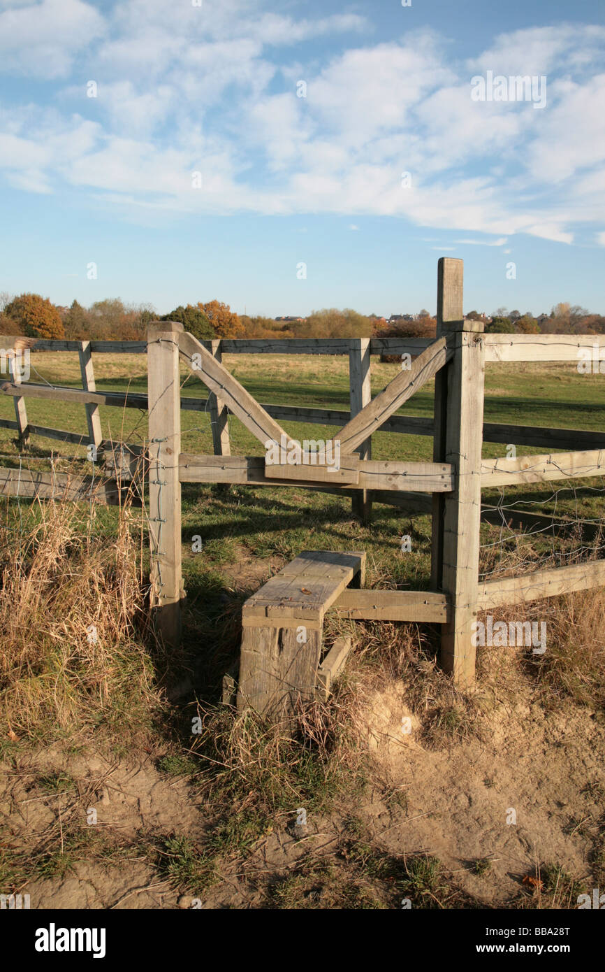 English country lane with prominant fence Stock Photo - Alamy