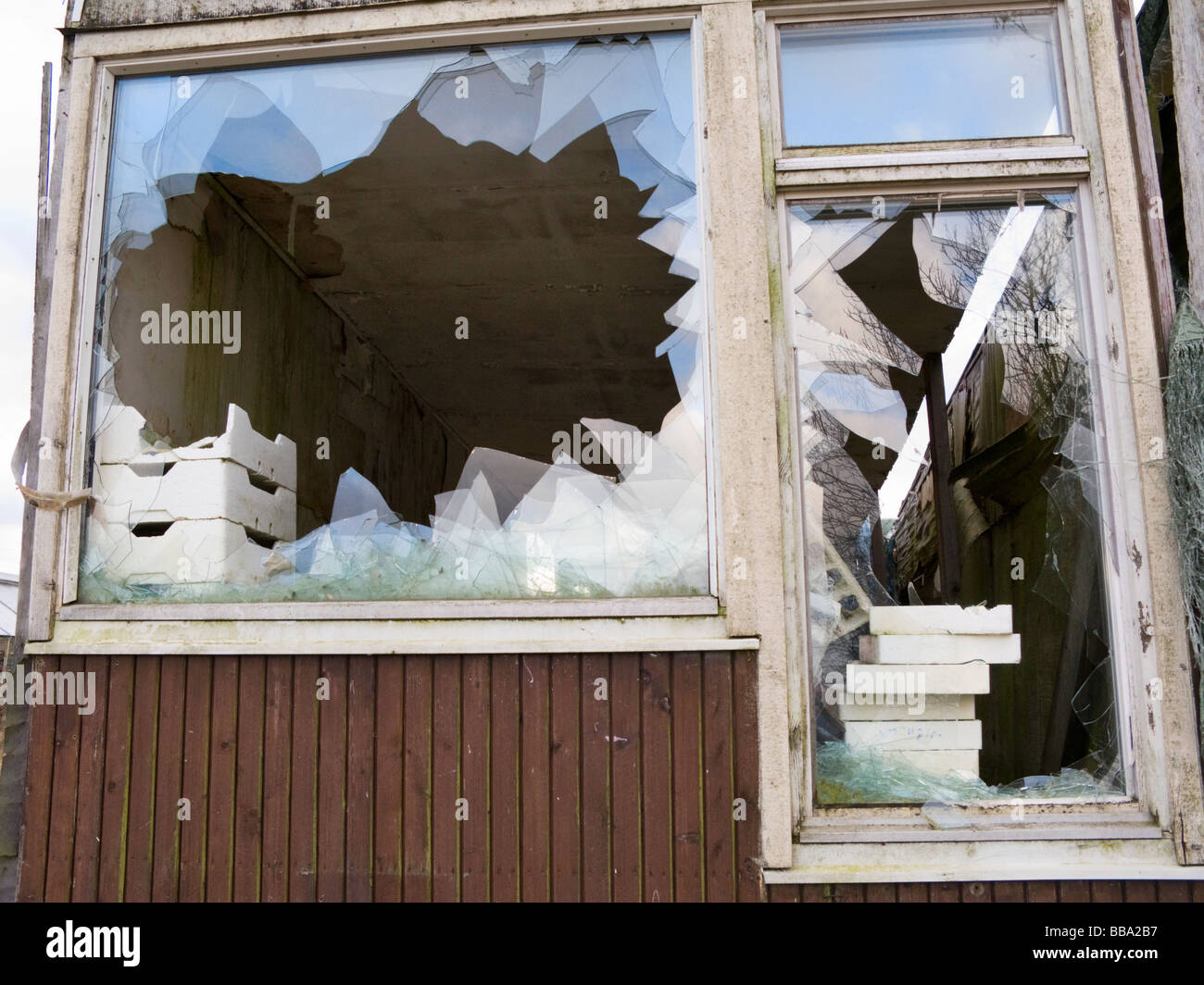 Broken glass windows Stock Photo - Alamy