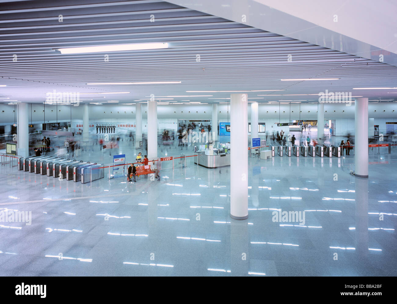 People in the hall of the People's Square metro station, Shanghai ...