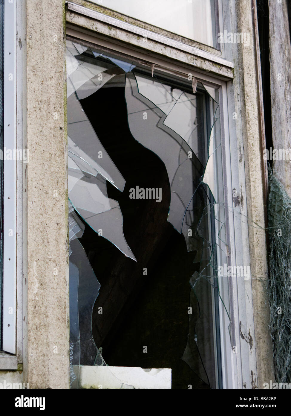 Broken glass windows Stock Photo - Alamy
