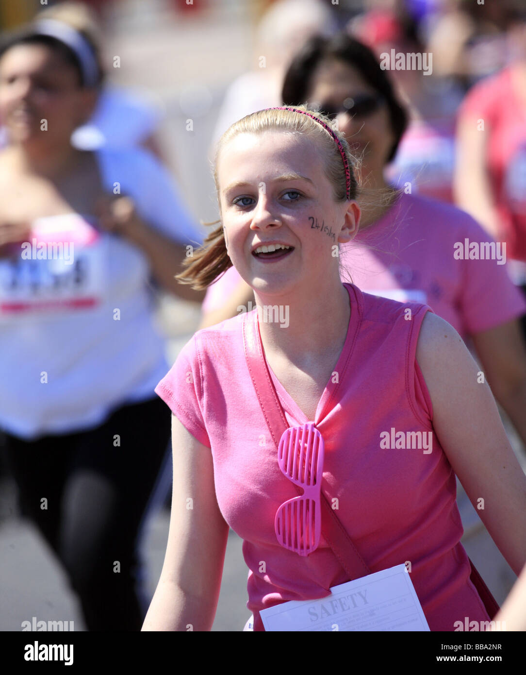 Smiling Young Woman Runner Race for Life Charity Event in Aid of Cancer ...