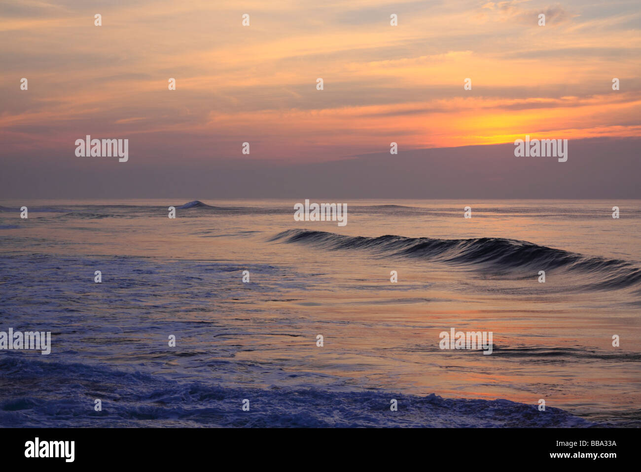 Calm ocean at daybreak Stock Photo - Alamy
