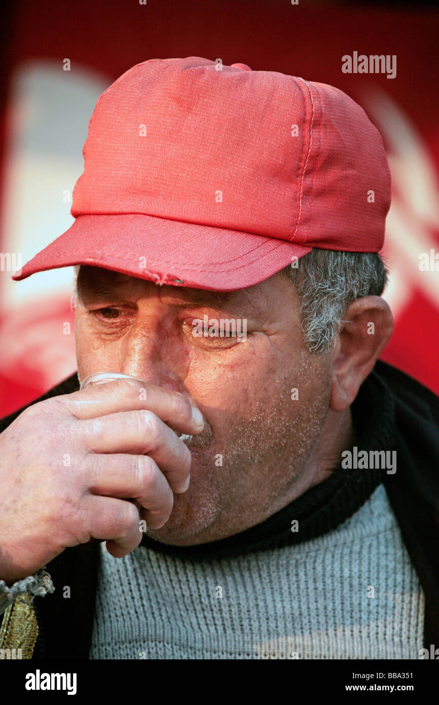 Turkish man drinking tea in Eminonu Stock Photo - Alamy