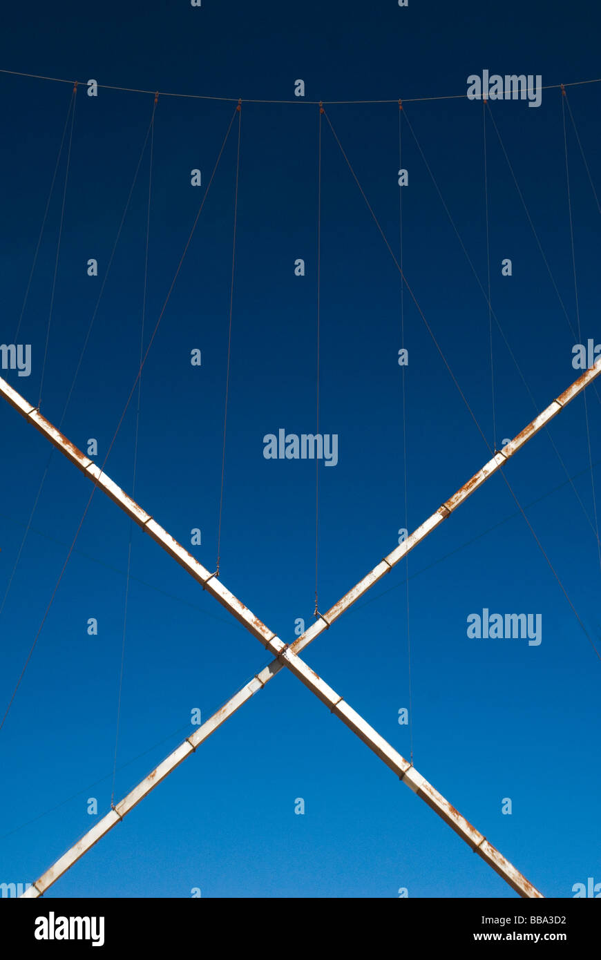 steel spiderweb, grain loading silo transfer tubes supported by wire ...