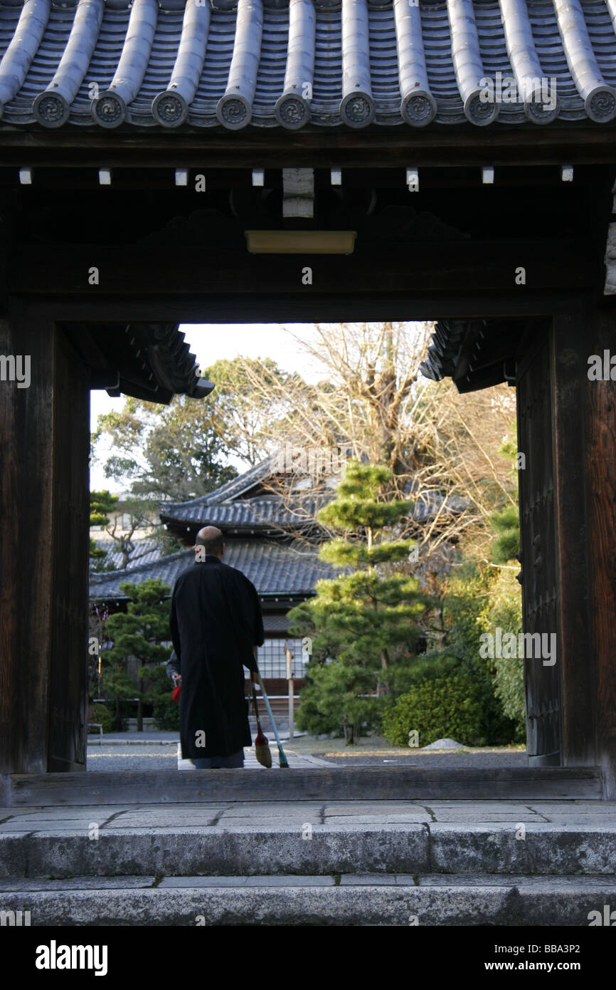 Monk at the entrance to Okazaki Betsuin Buddhist Temple Kyoto Japan ...