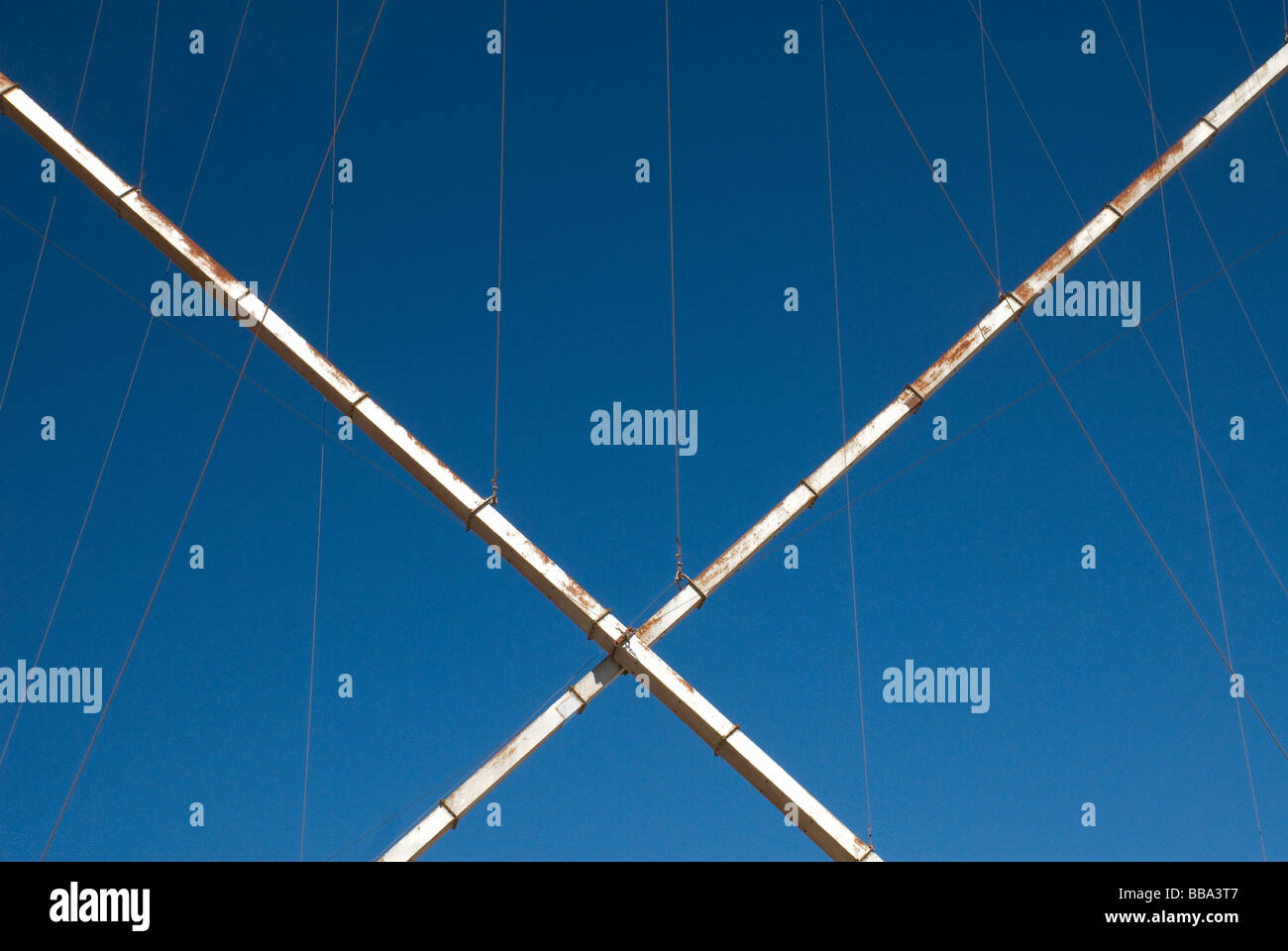 steel spiderweb, grain loading silo transfer tubes supported by wire ...