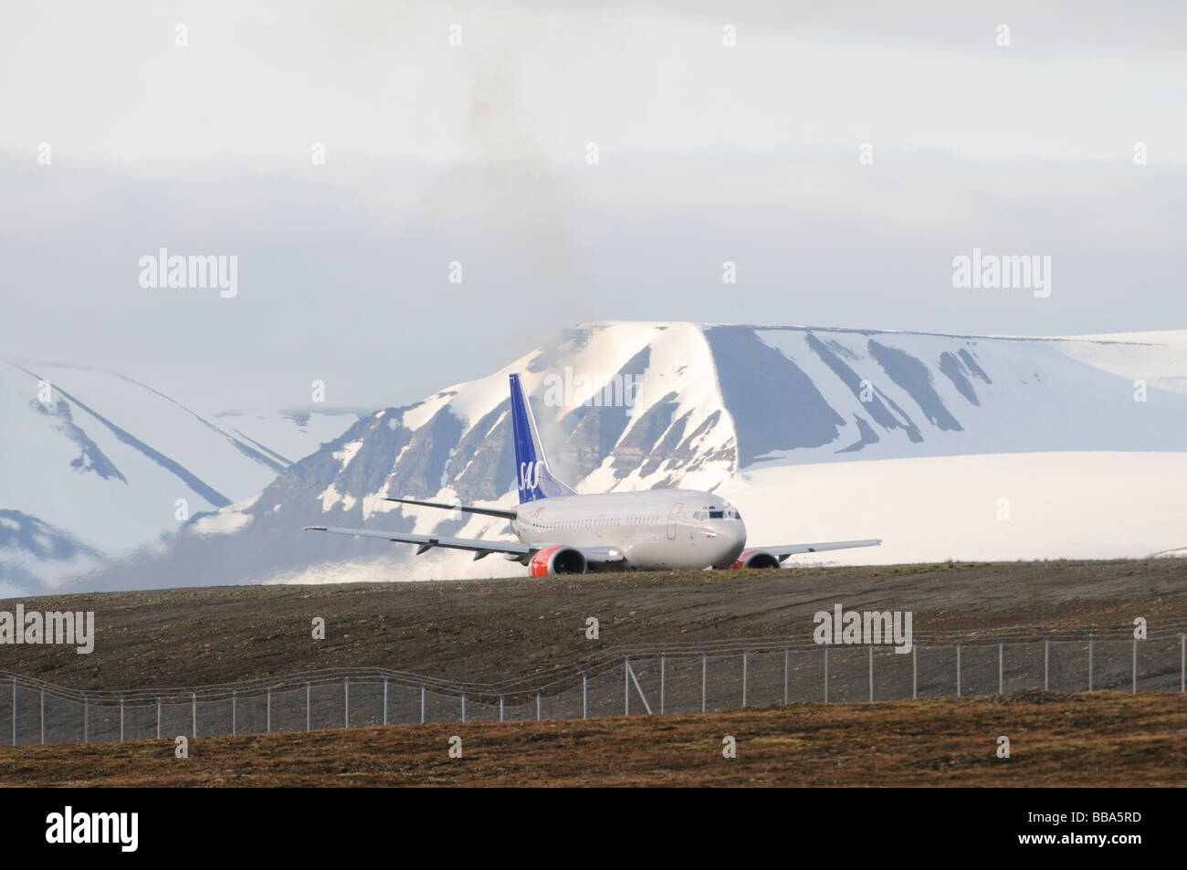 Commercial airplane taking off at the Longyearbyen airport Svalbard ...