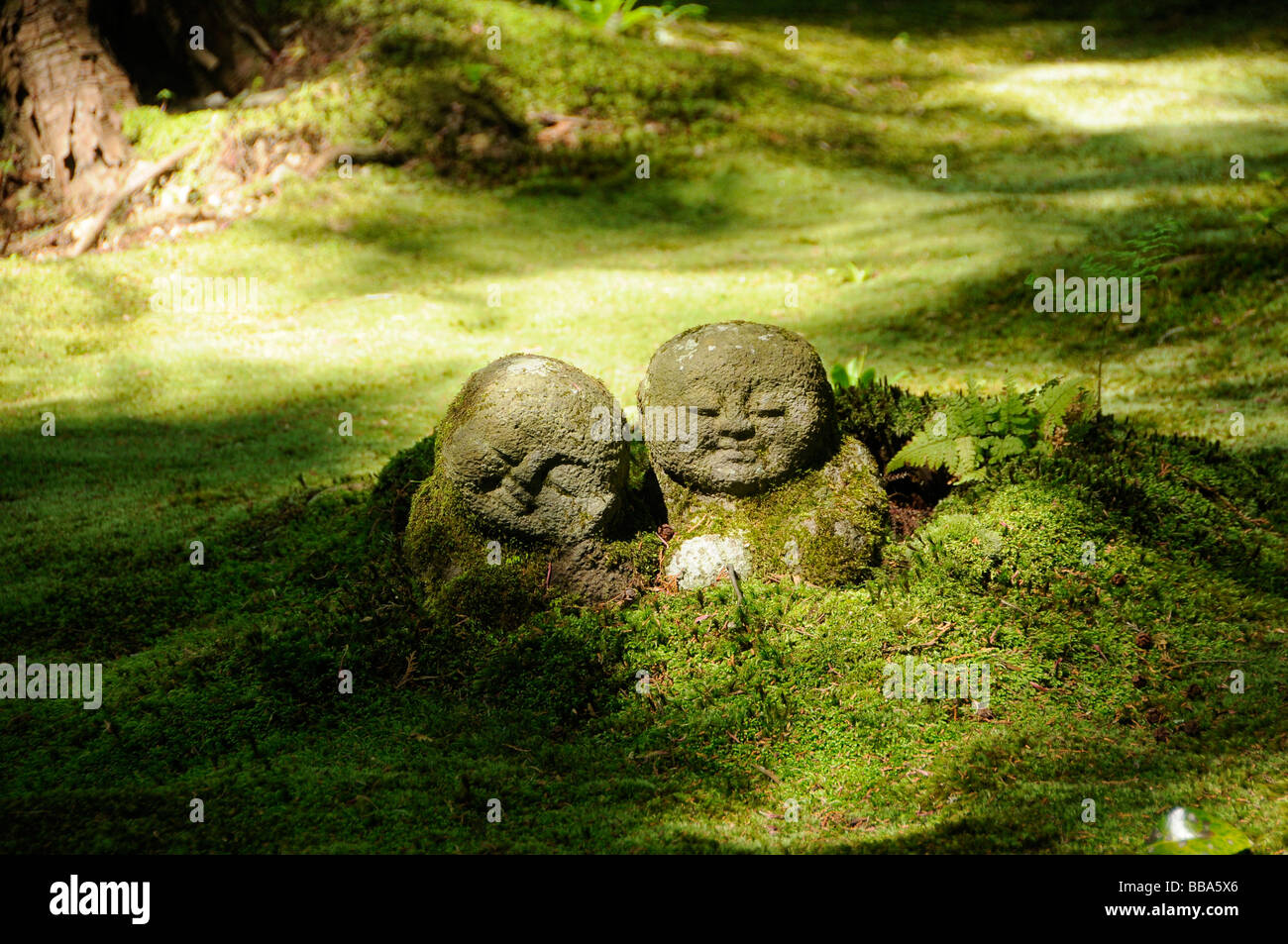 Buddhist Jizo figures in the moss garden of the Sanzen-in temple in ...