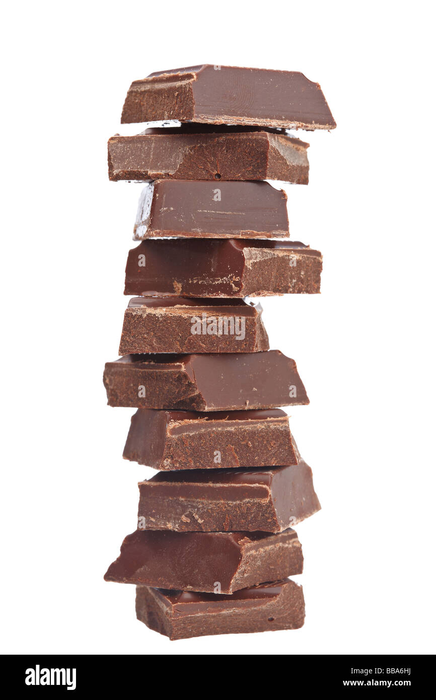 Blocks of chocolate isolated on white background Shallow depth of field ...