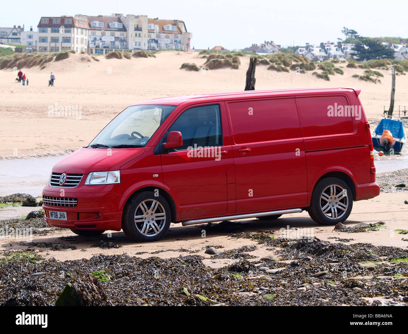 Red VW van at the beach Stock Photo - Alamy