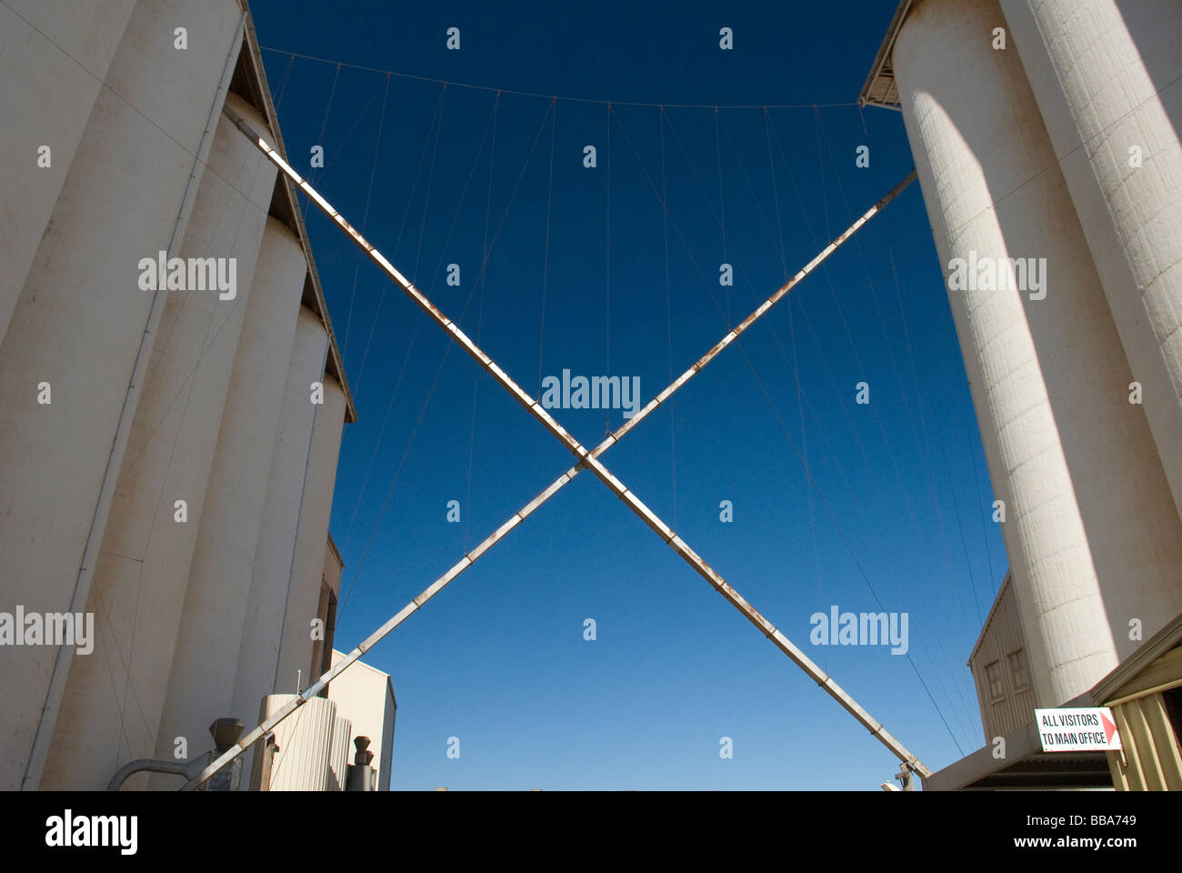 steel spiderweb, grain loading silo transfer tubes supported by wire ...