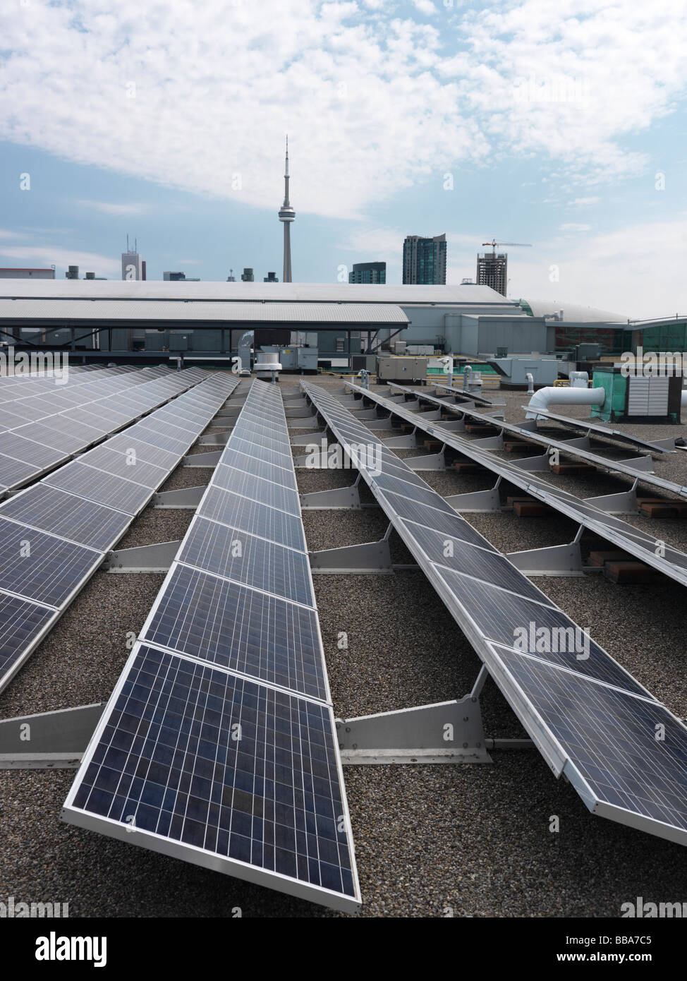 Solar panels on a roof of a building Stock Photo - Alamy