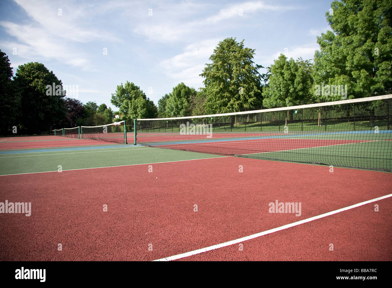 Outdoor all weather tennis court in summer Stock Photo - Alamy