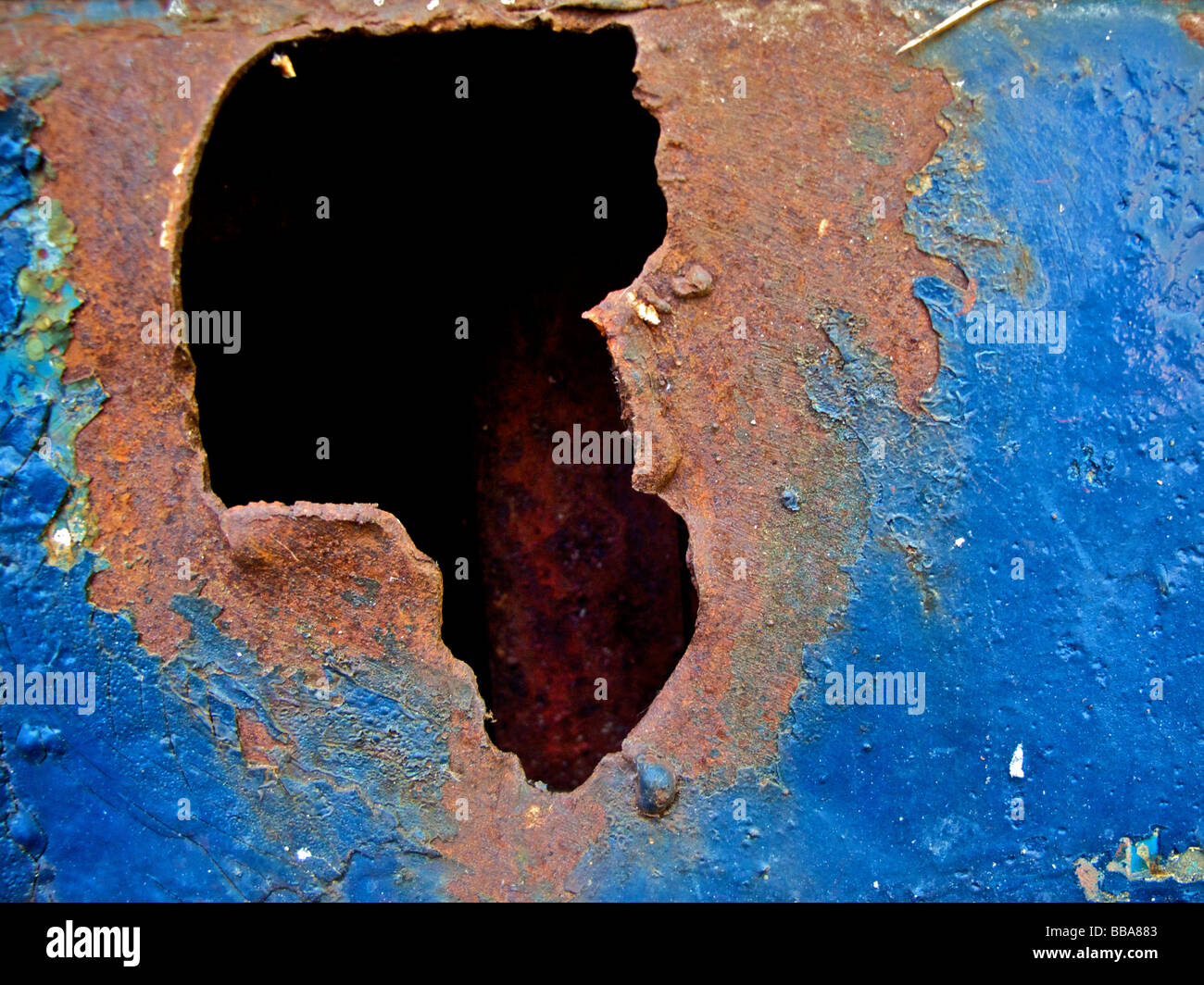 A rusted hole in the shape of Africa Stock Photo - Alamy