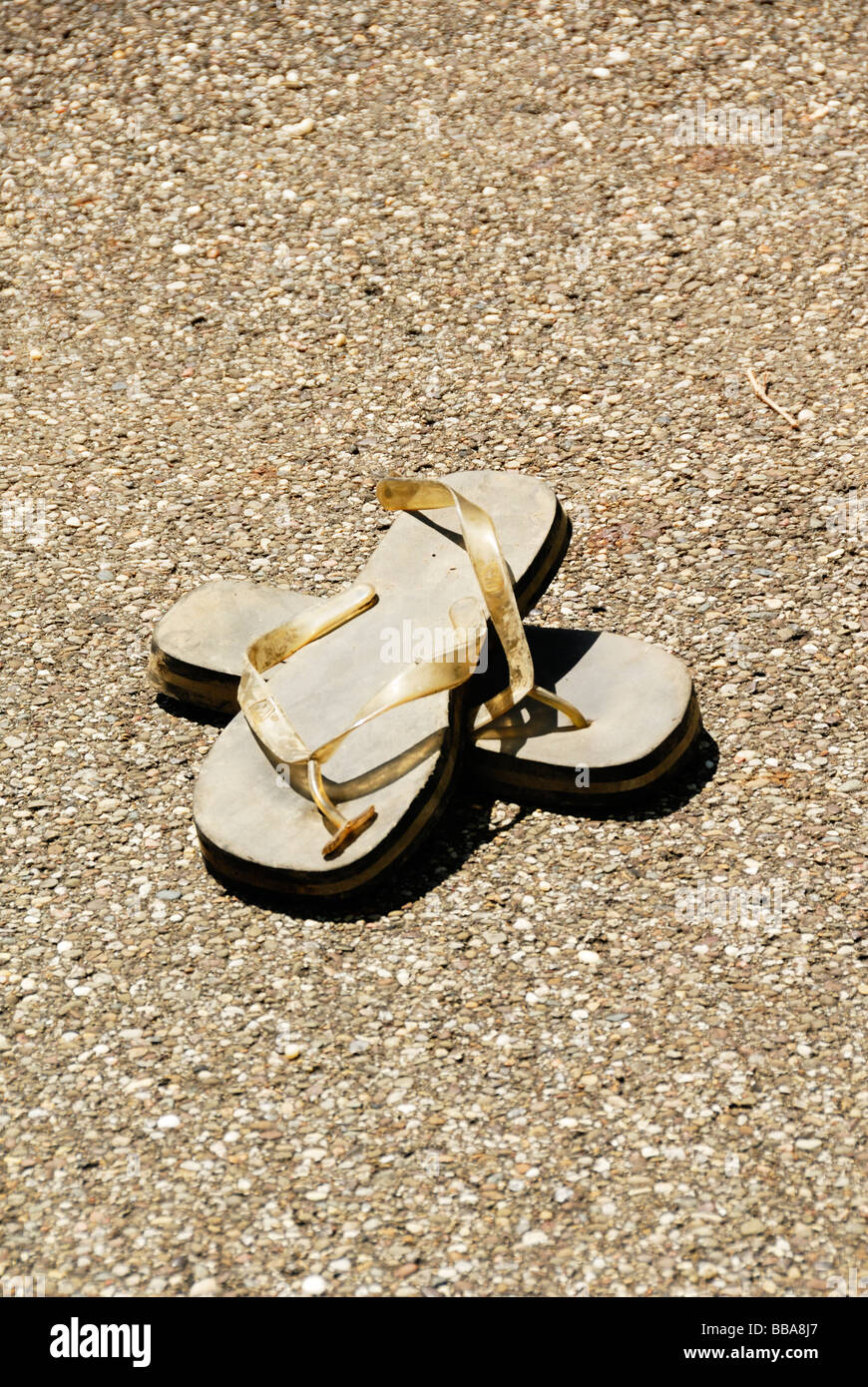 broken sandle on road Stock Photo - Alamy
