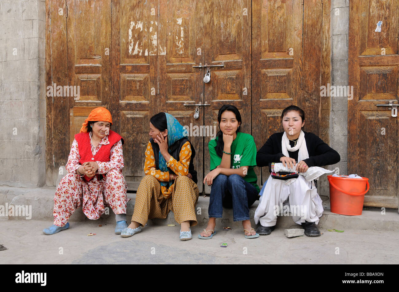 Ladakhi women in the evening in the historic town centre, Leh, Ladakh ...