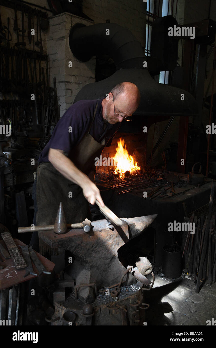 Blacksmith working at Ryhope Engines Museum, North East England, UK ...