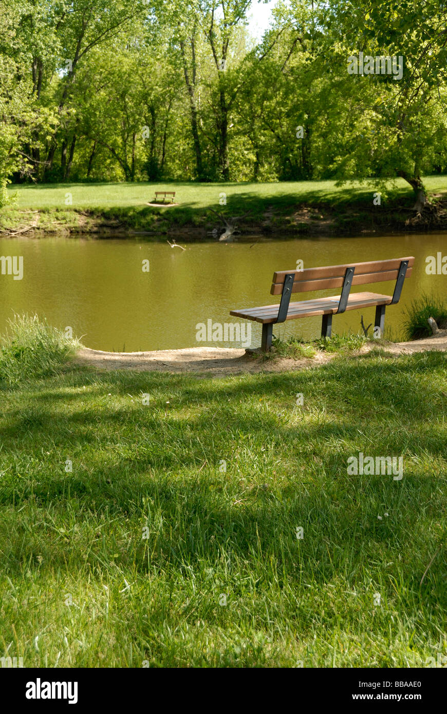 bench by fishing pond Stock Photo - Alamy