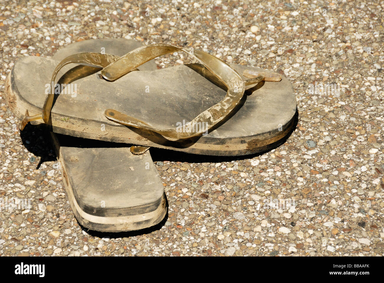 broken sandle on road Stock Photo - Alamy