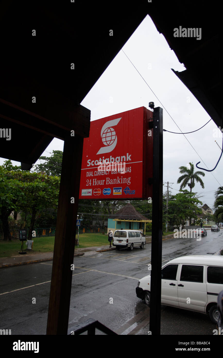 Seen from shelter from rain, a Scotiabank sign Stock Photo - Alamy
