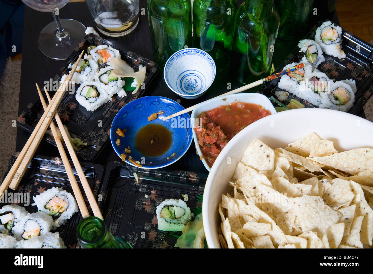Food leftovers and dirty dishes on a table Stock Photo - Alamy