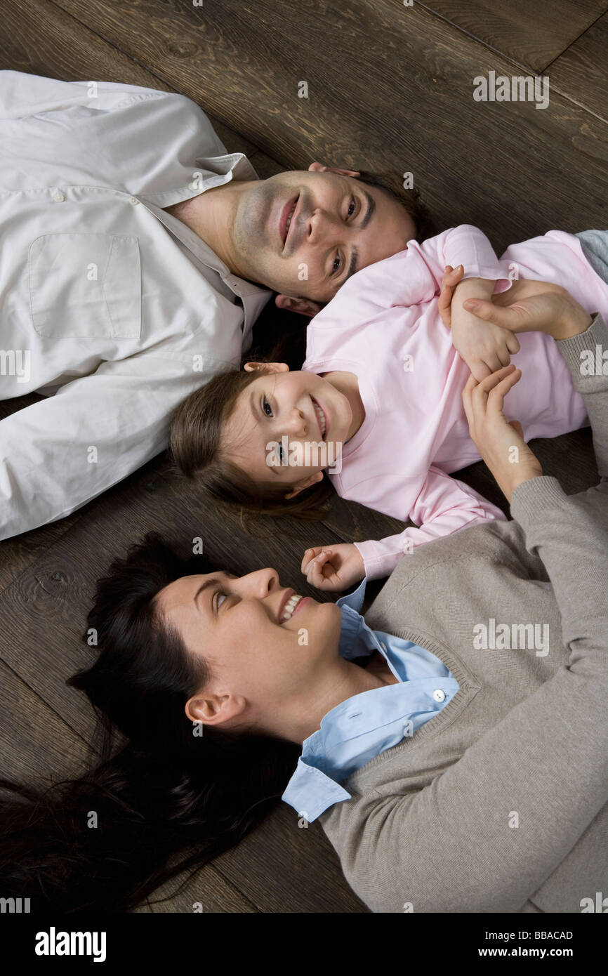 Portrait of two parents and their child Stock Photo - Alamy