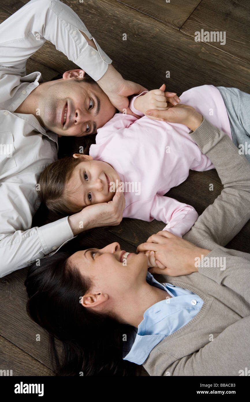 Portrait of two parents and their child Stock Photo - Alamy
