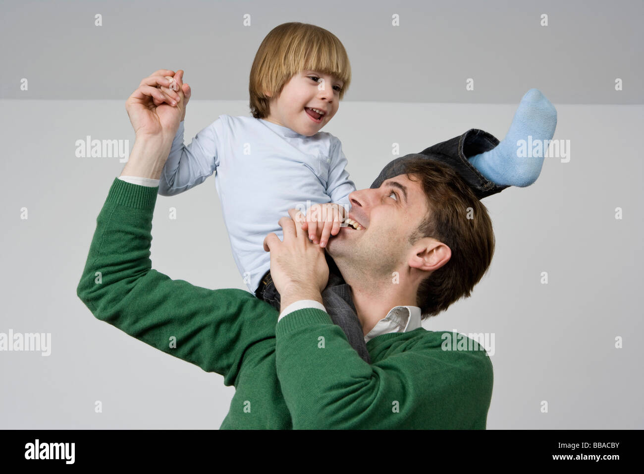 A father and son rough housing Stock Photo - Alamy