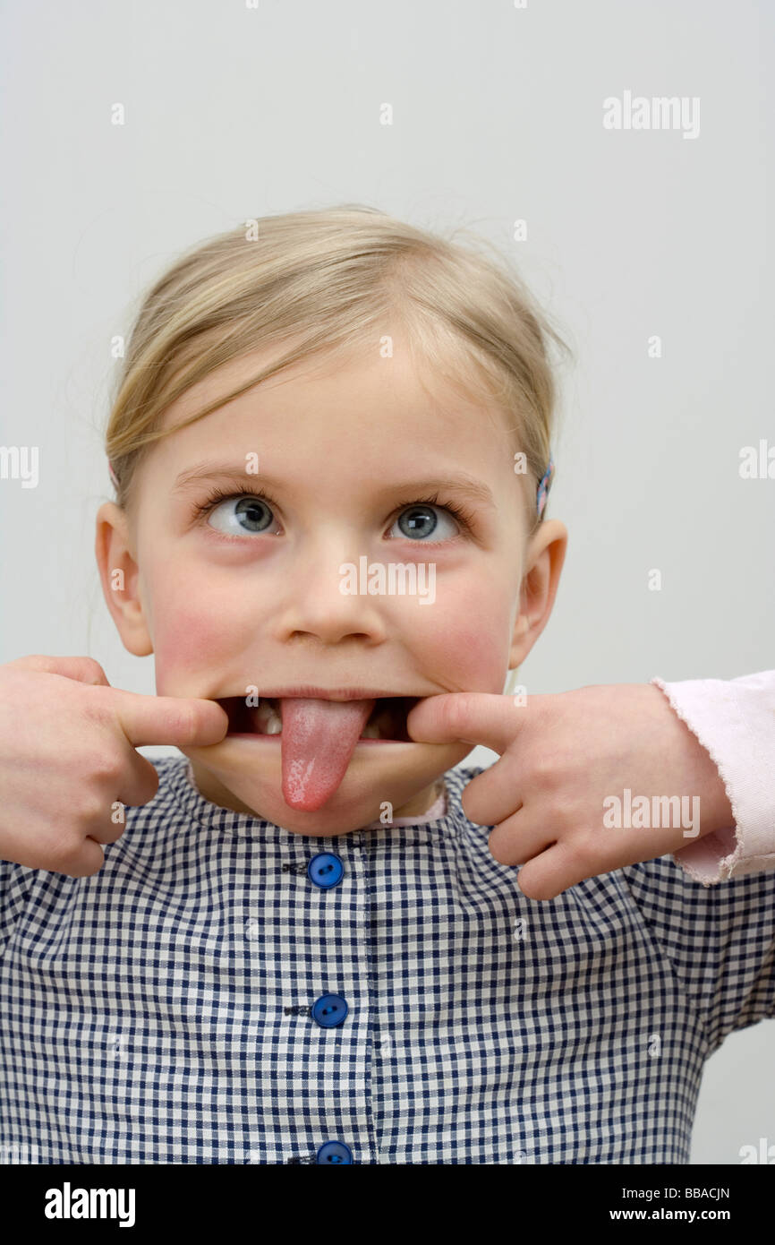 A little girl making a face Stock Photo - Alamy