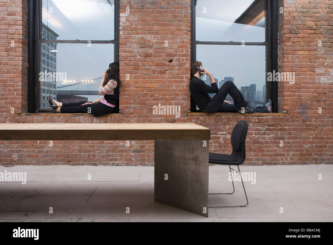 Woman sitting by a window hi-res stock photography and images - Alamy