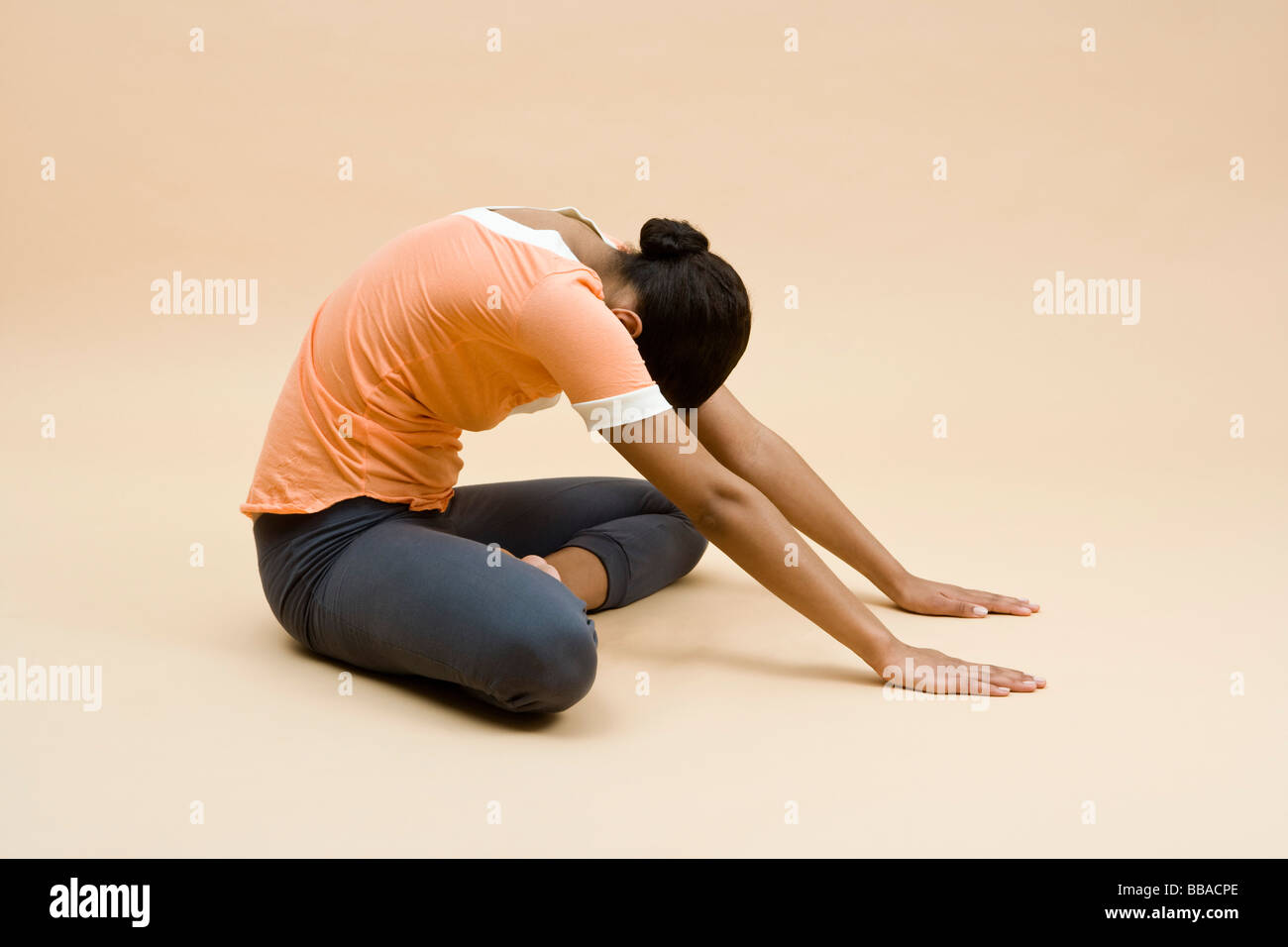 A young woman doing exercise Stock Photo - Alamy