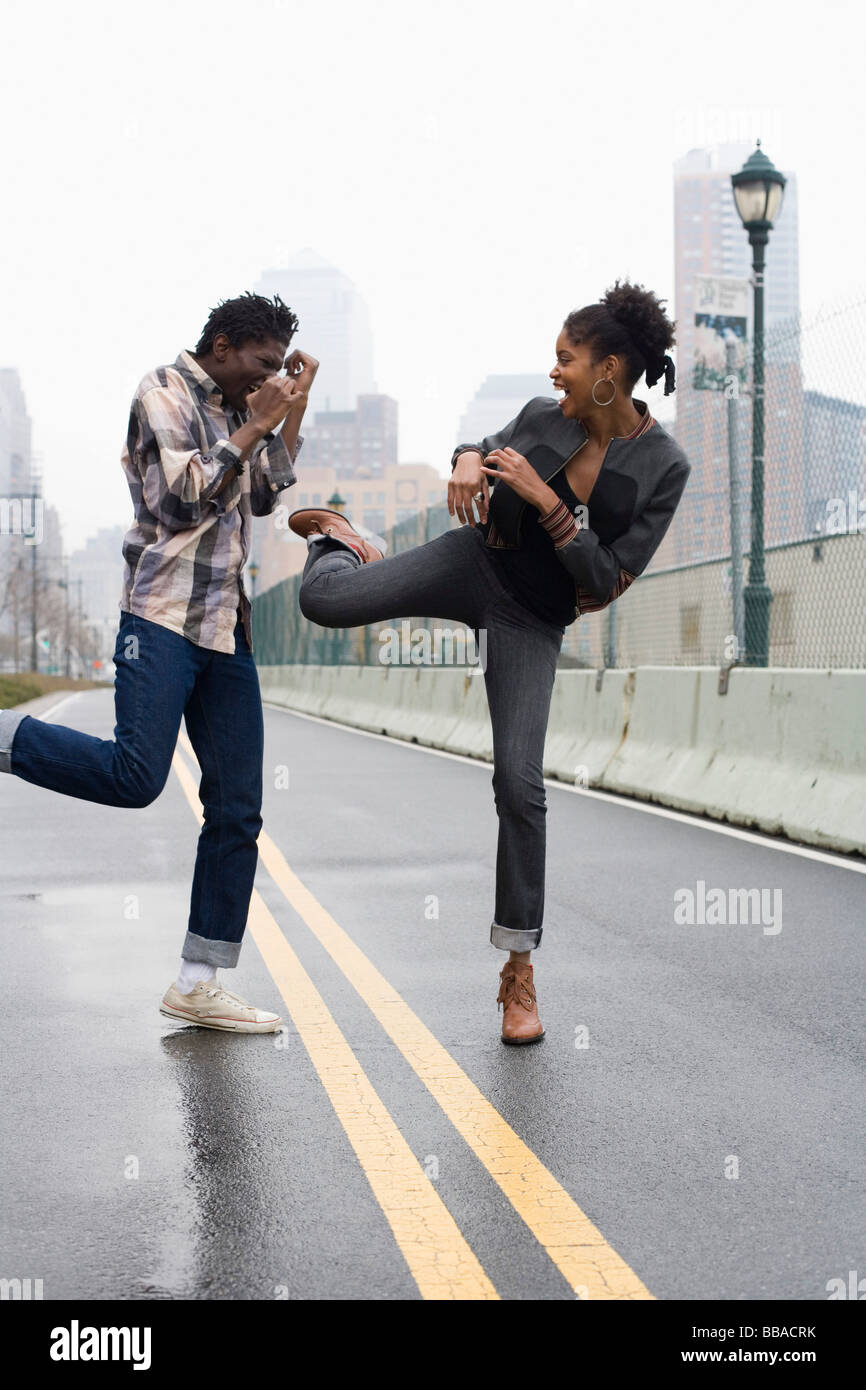 Women fighting street hi-res stock photography and images - Alamy
