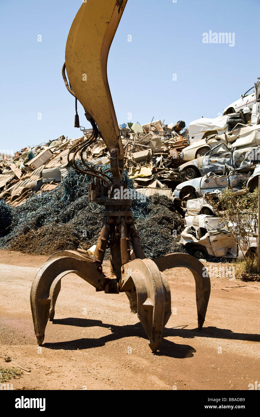 A hydraulic crane in a scrap metal yard Stock Photo - Alamy