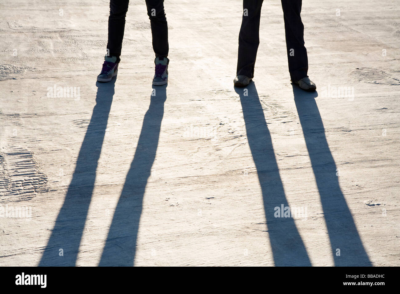 The legs of two people Stock Photo - Alamy