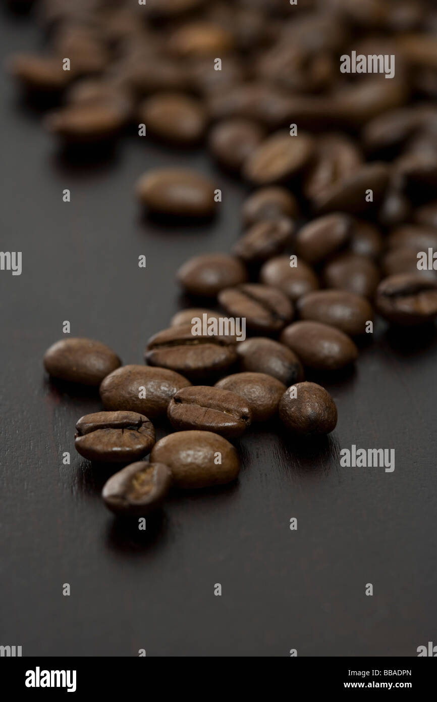 Scattered coffee beans Stock Photo - Alamy