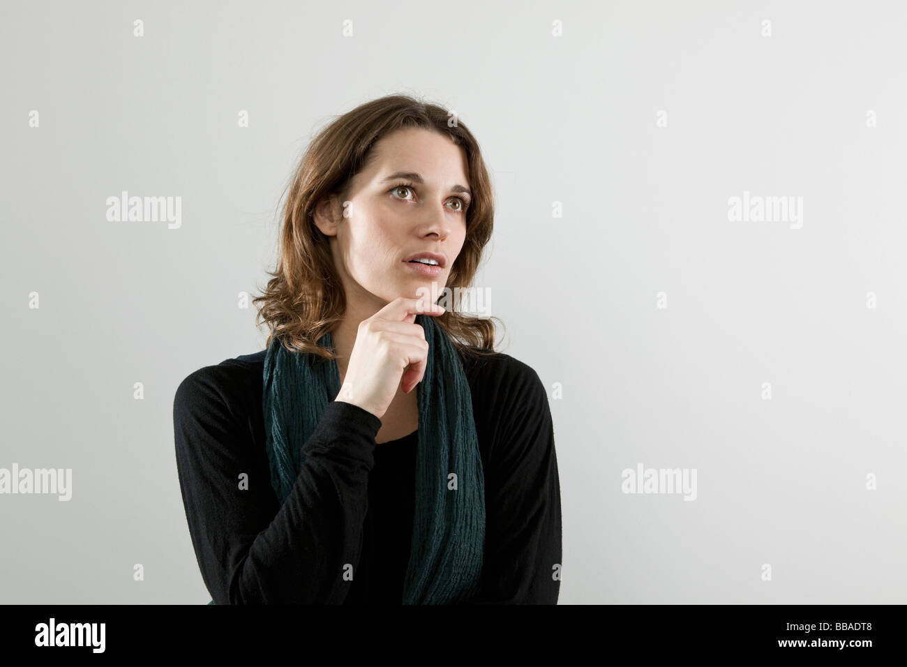 A woman thinking, portrait Stock Photo - Alamy