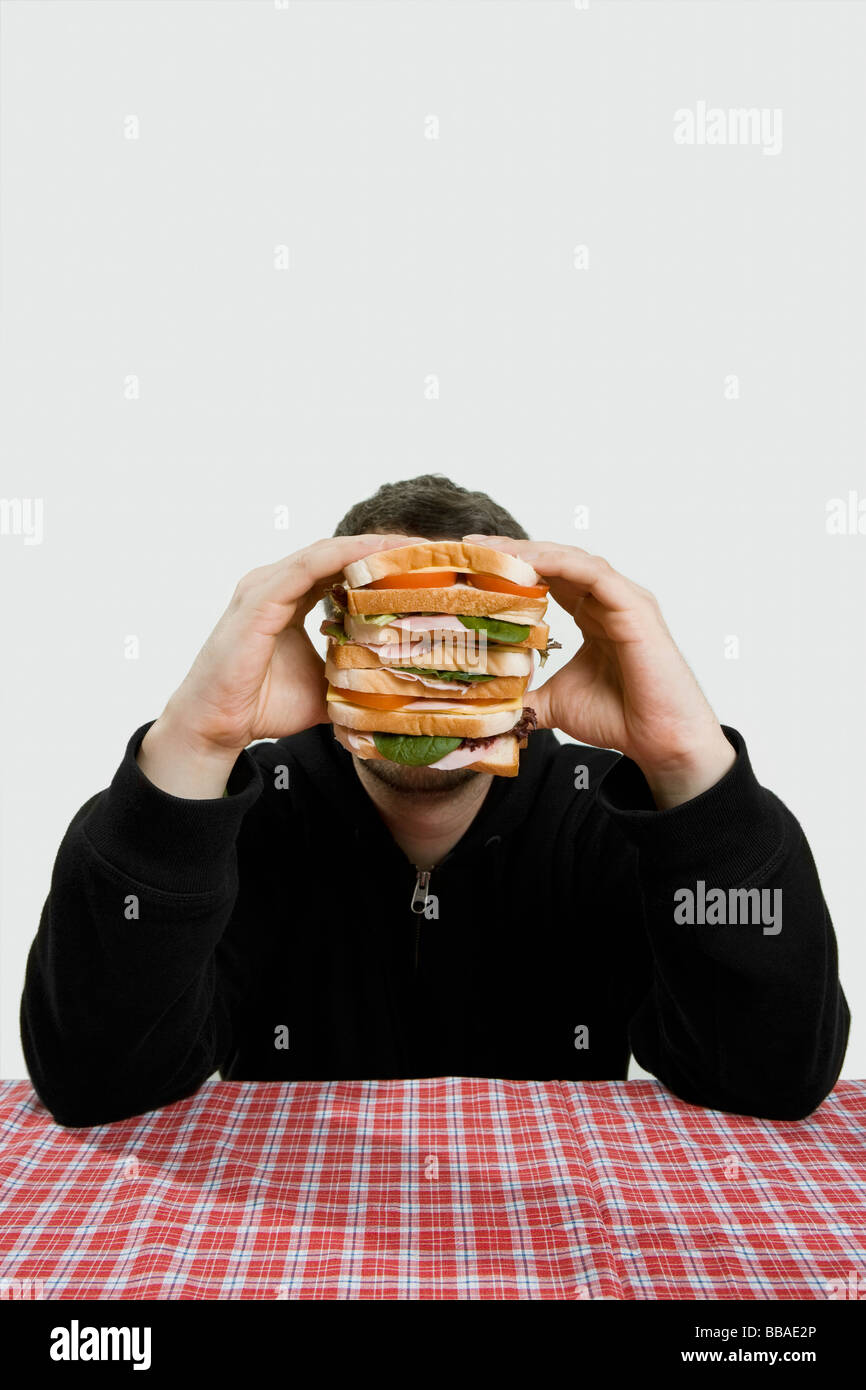 Man eating sandwich studio hi-res stock photography and images - Alamy