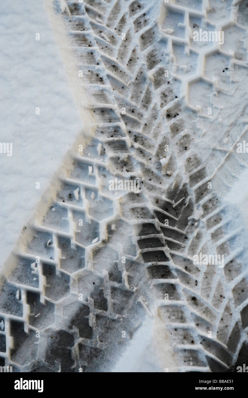 Tire tracks in snow Stock Photo - Alamy