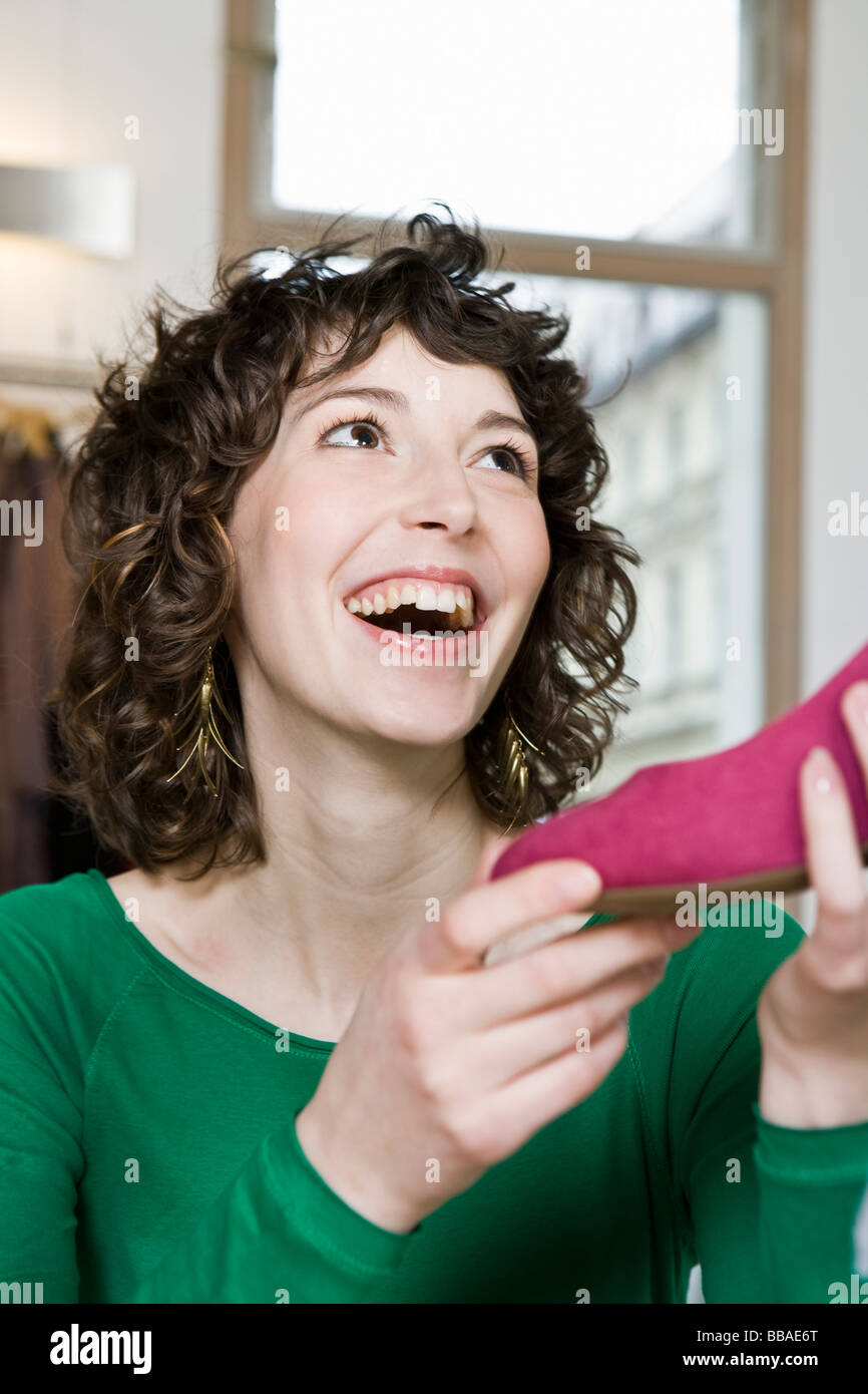 Woman shoe assistant hi-res stock photography and images - Alamy