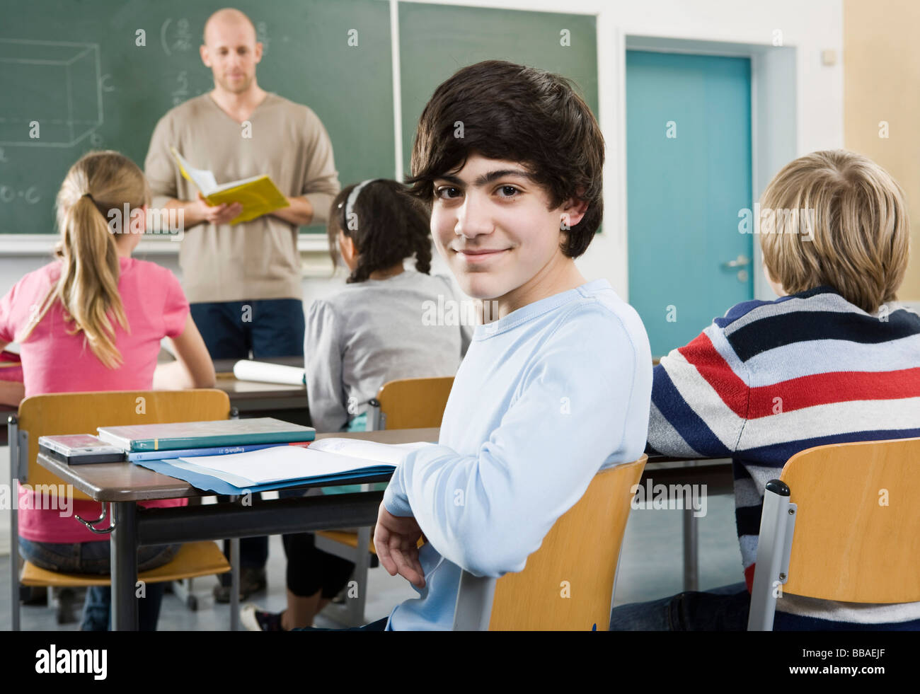 14 15 sitting in classroom hi-res stock photography and images - Alamy