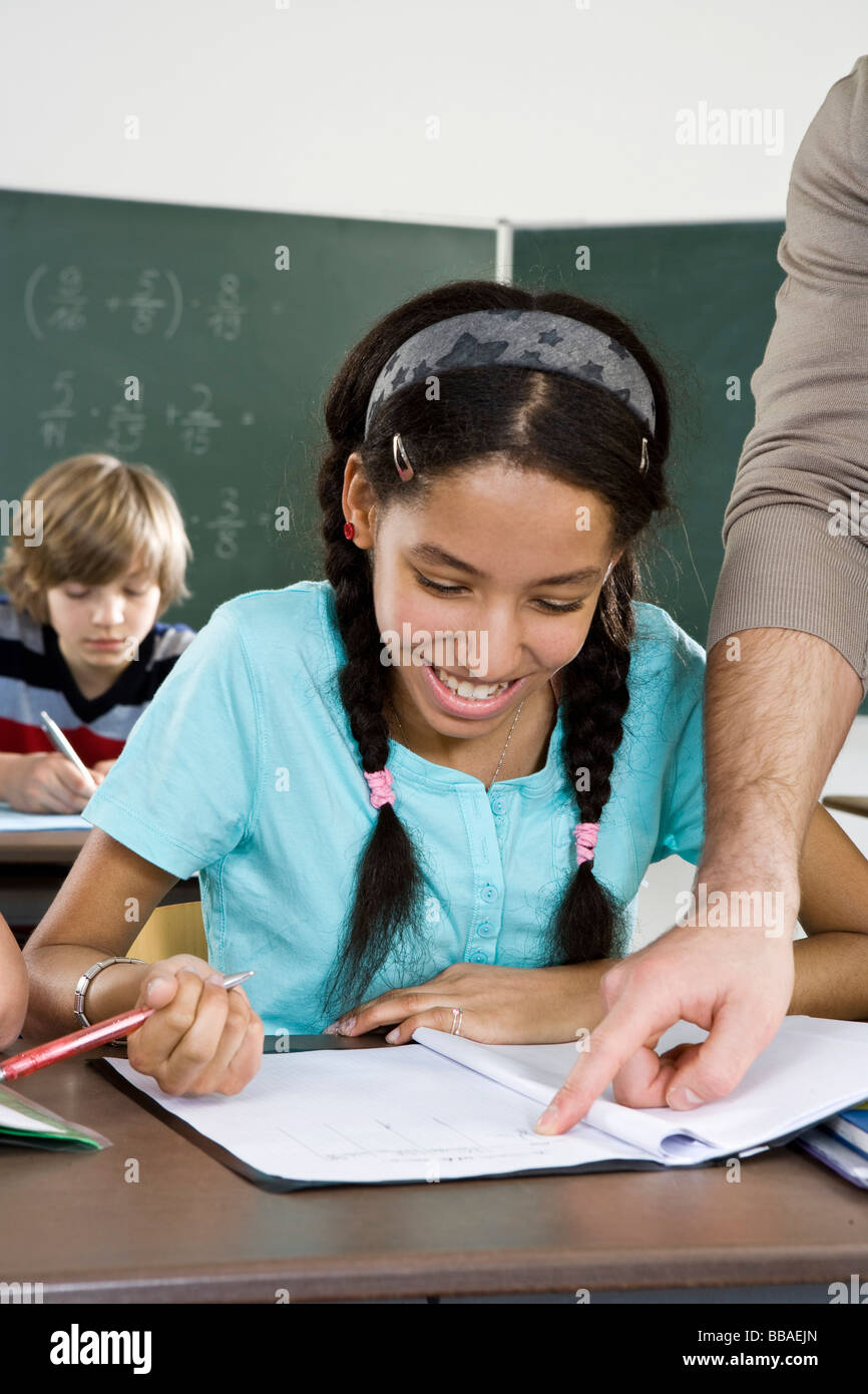 Teacher pointing back view hi-res stock photography and images - Alamy