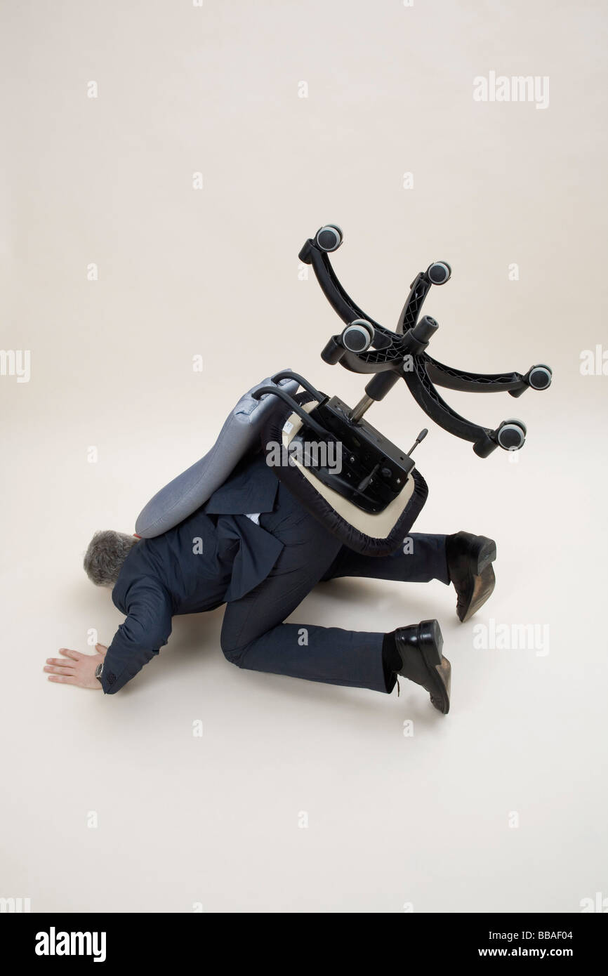 Businessman leaning over office chair hi-res stock photography and ...