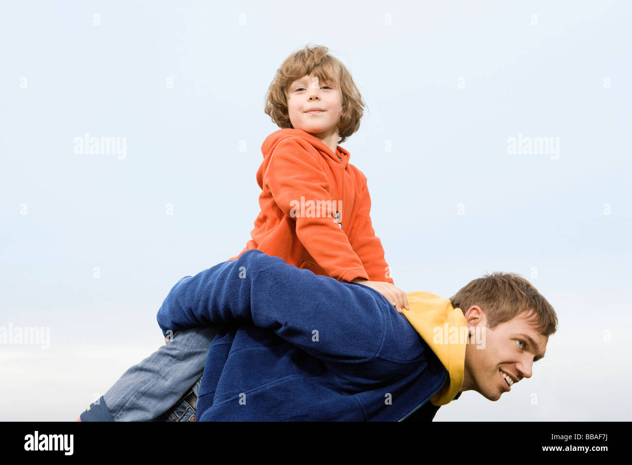Carrying under arms hi-res stock photography and images - Alamy