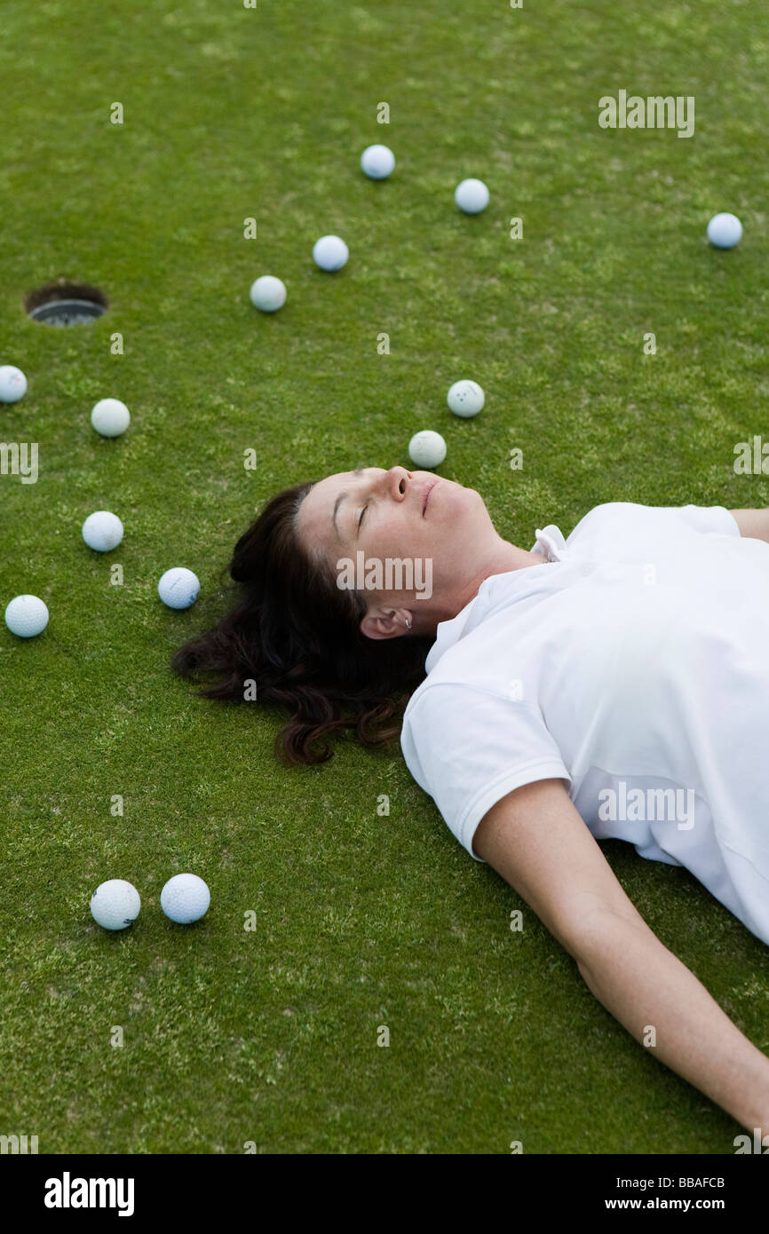 Golfer lying down hi-res stock photography and images - Alamy