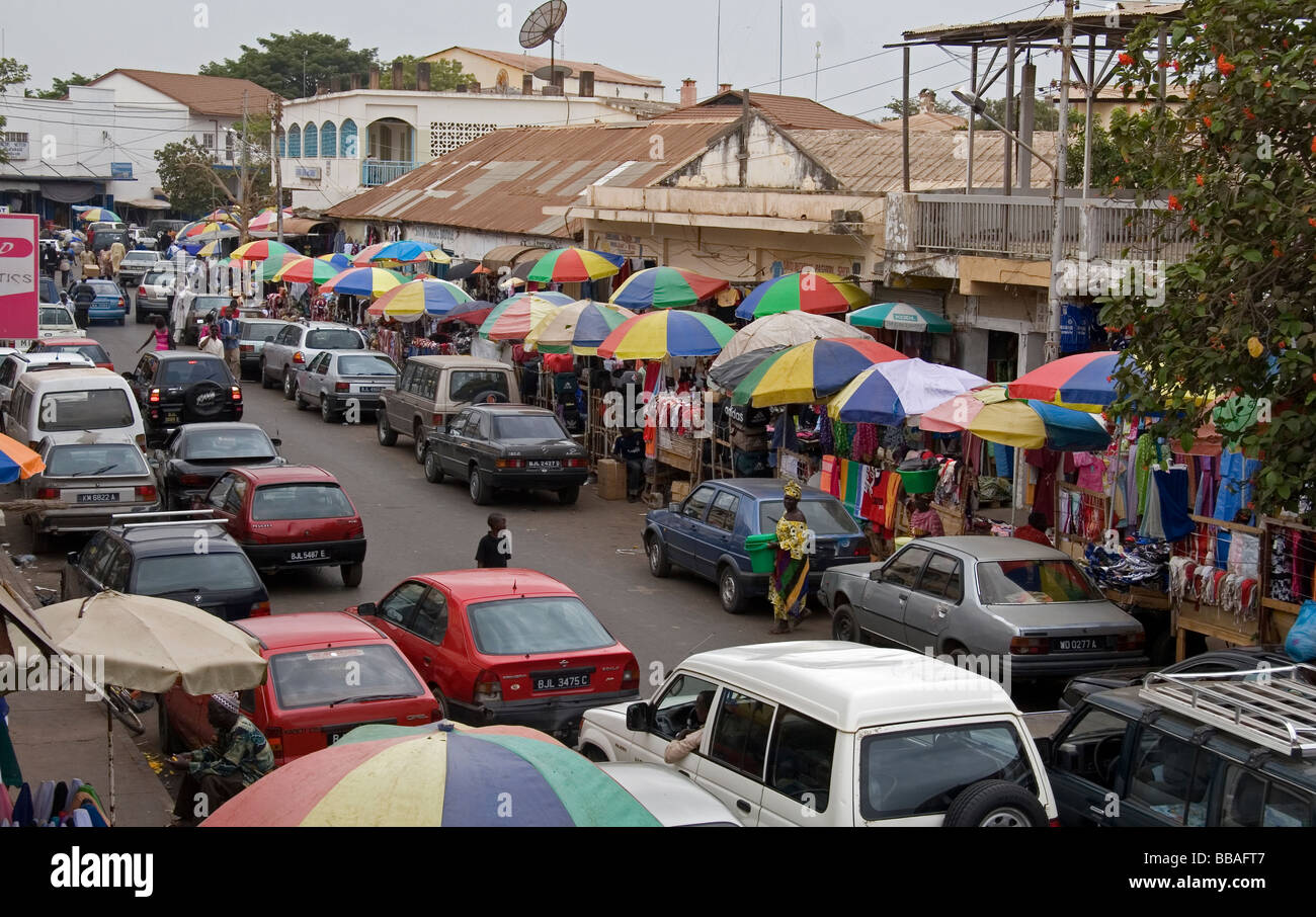 Albert Market scene Banjul Gambia West Africa with stores lining street ...