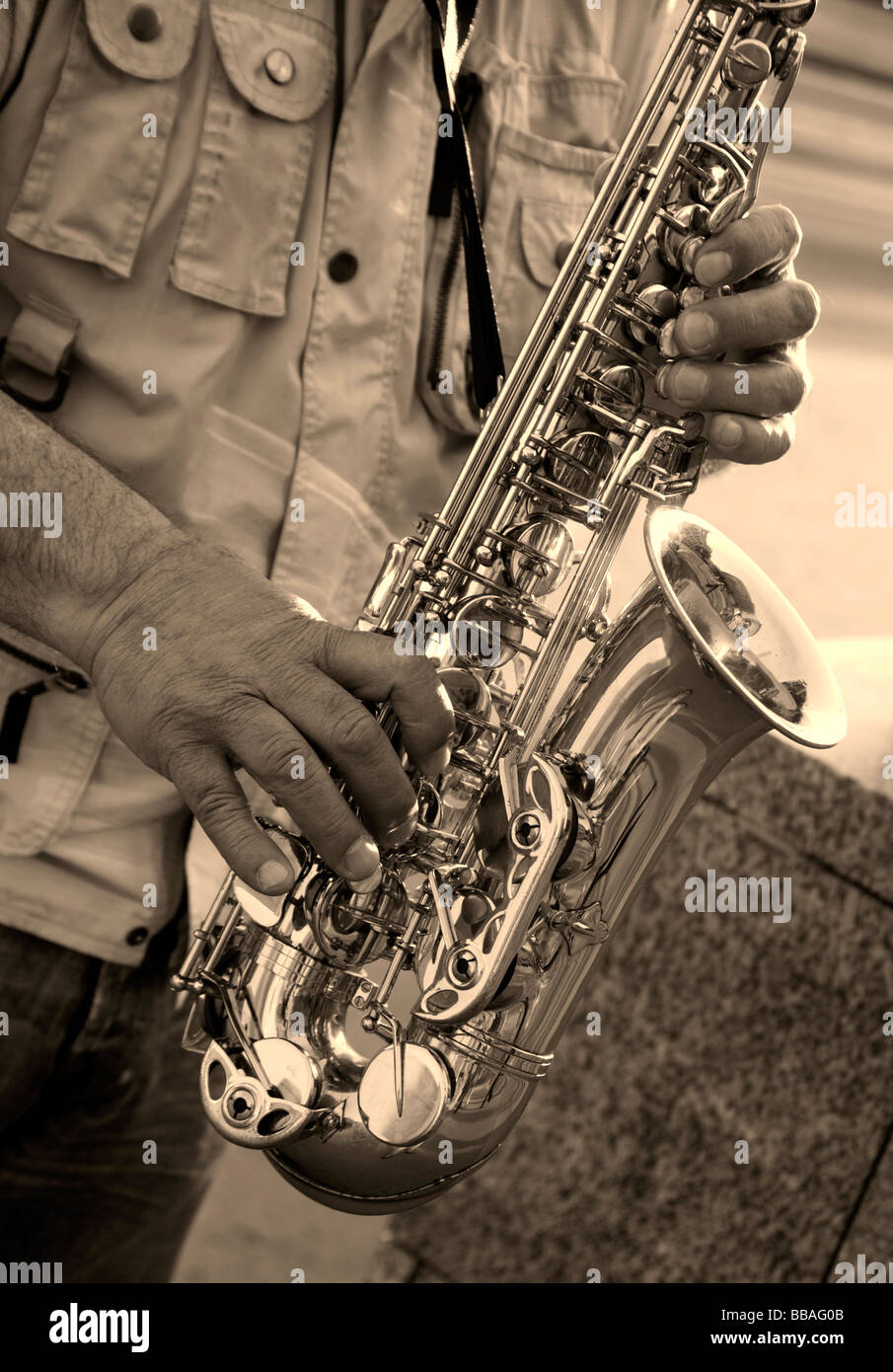 hands of saxophone player Stock Photo - Alamy