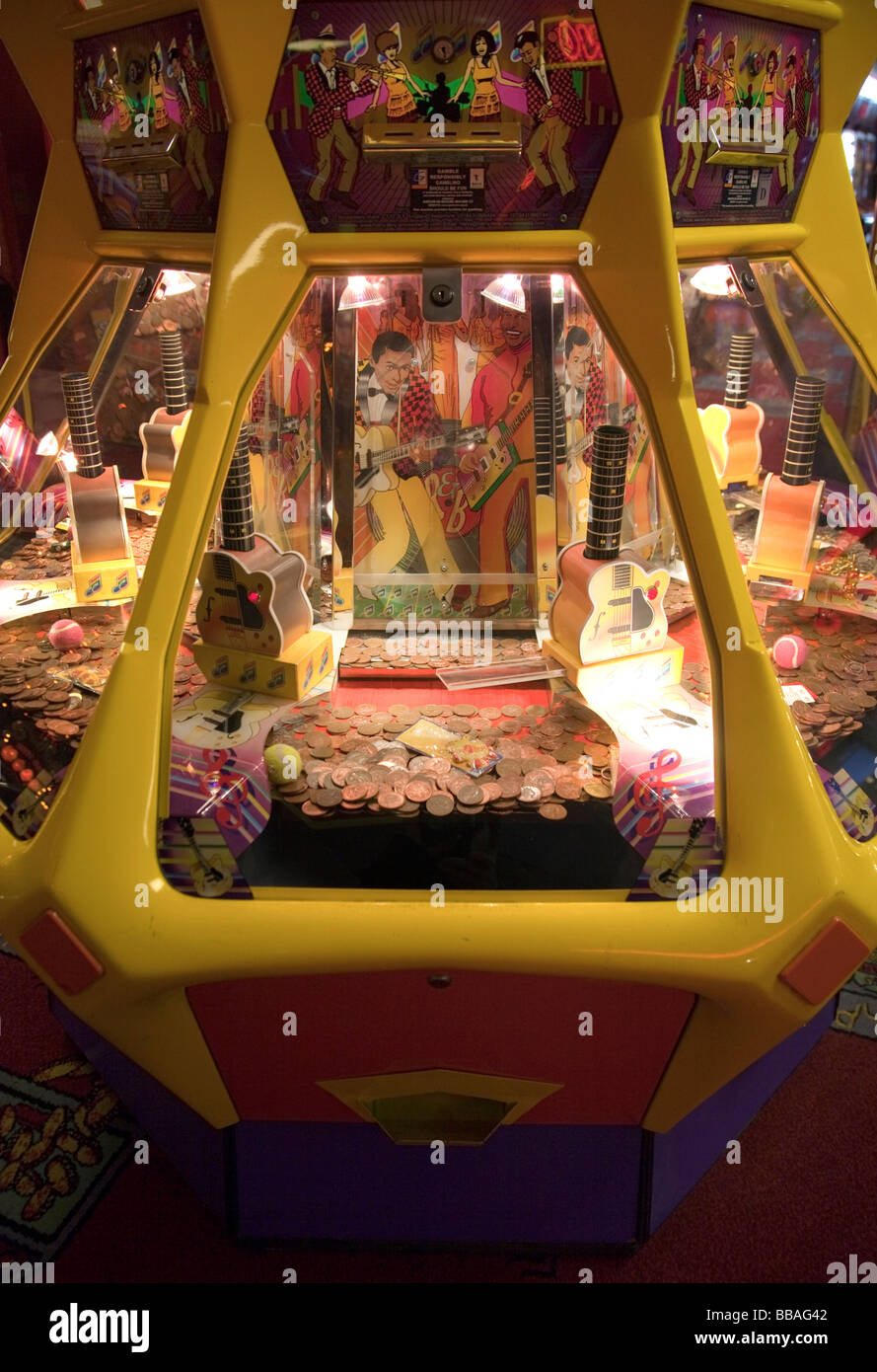 Amusement Arcade Game Money Stock Photos & Amusement Arcade Game Money ...