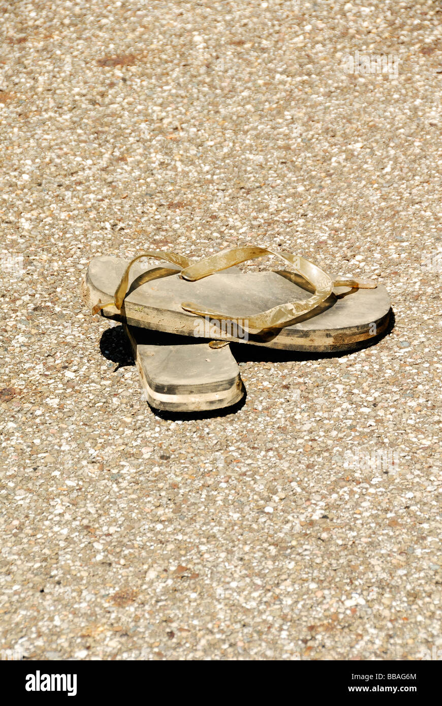 broken sandle on road Stock Photo - Alamy