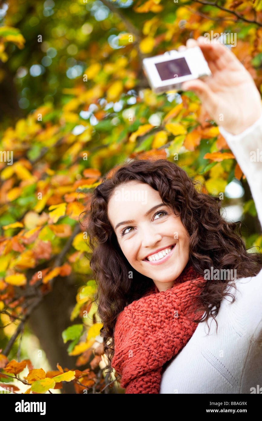 young woman taking self-portrait Stock Photo - Alamy