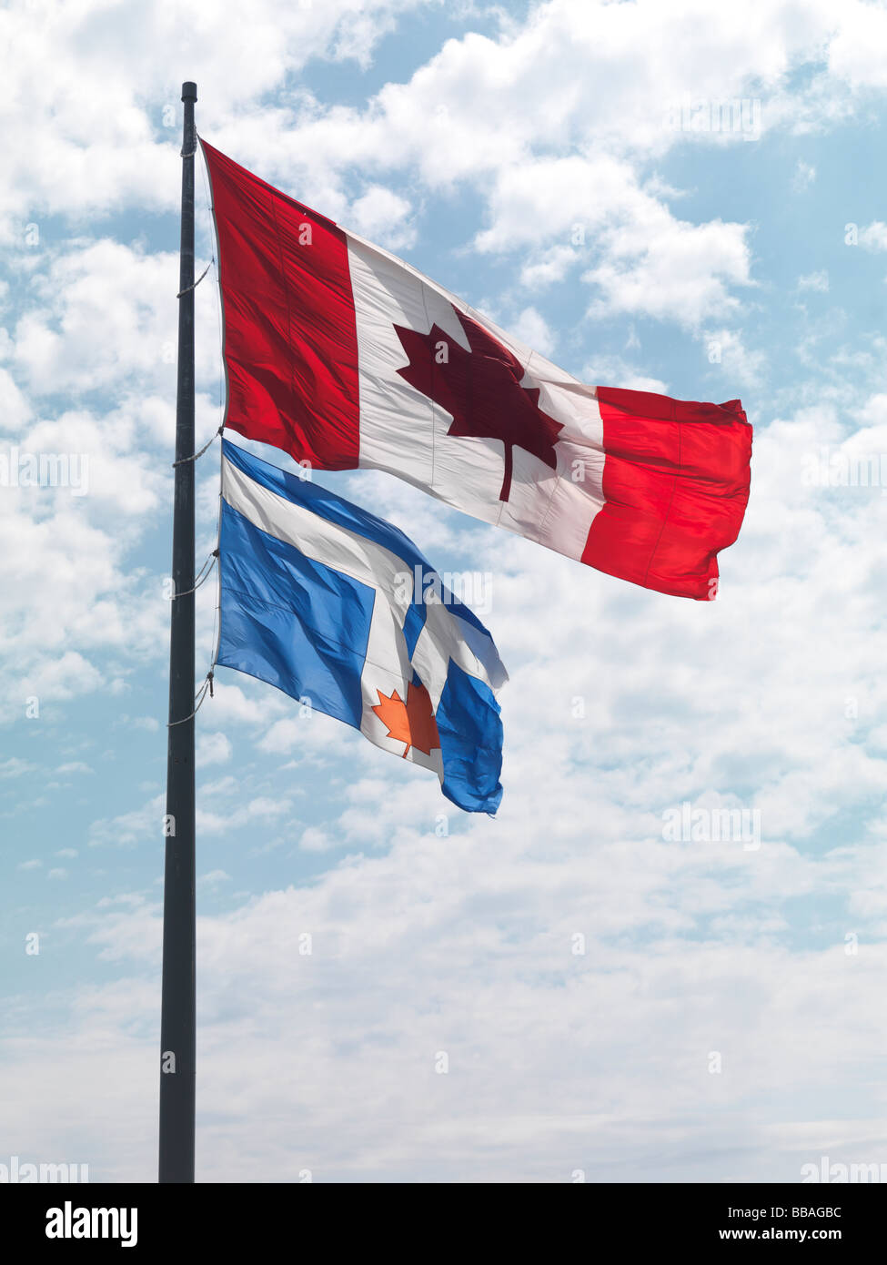 Flags of Canada and Toronto flying in the wind Stock Photo - Alamy